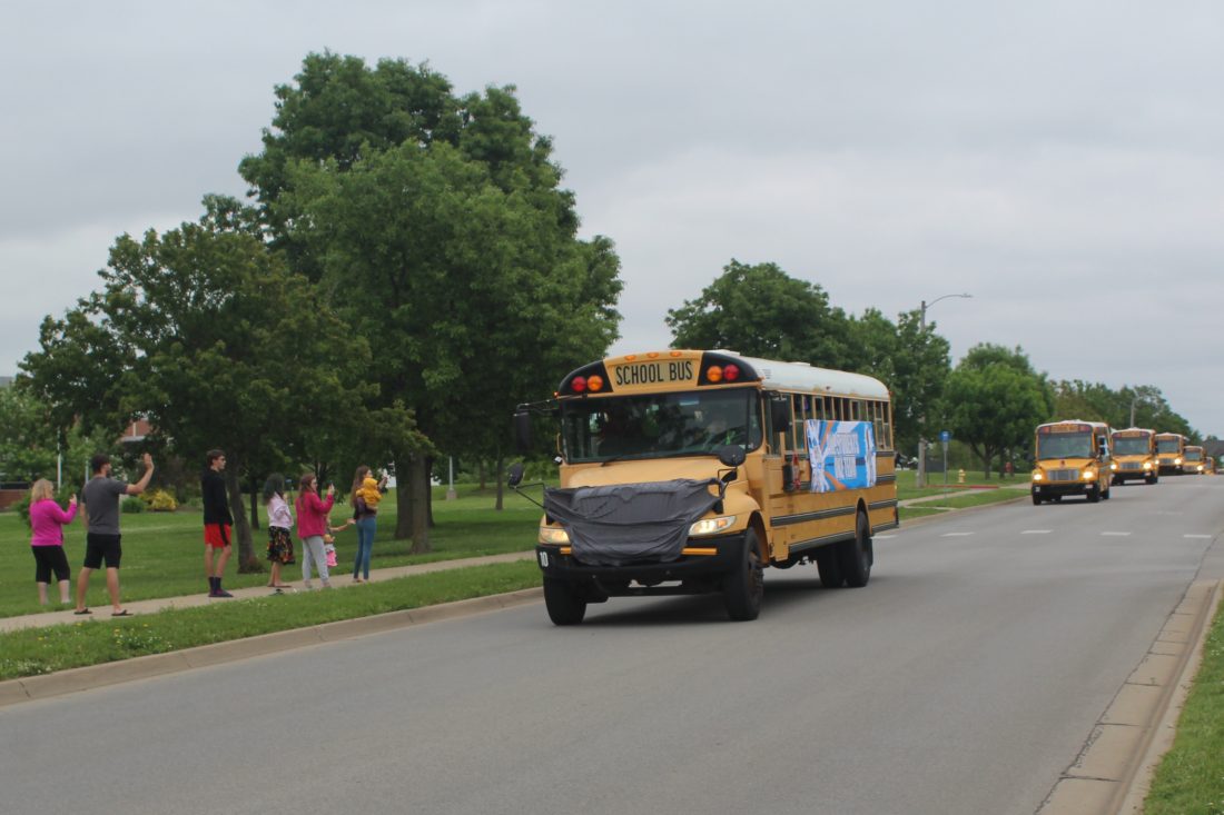Bus parade honors high school graduates in Lawrence | News, Sports ...